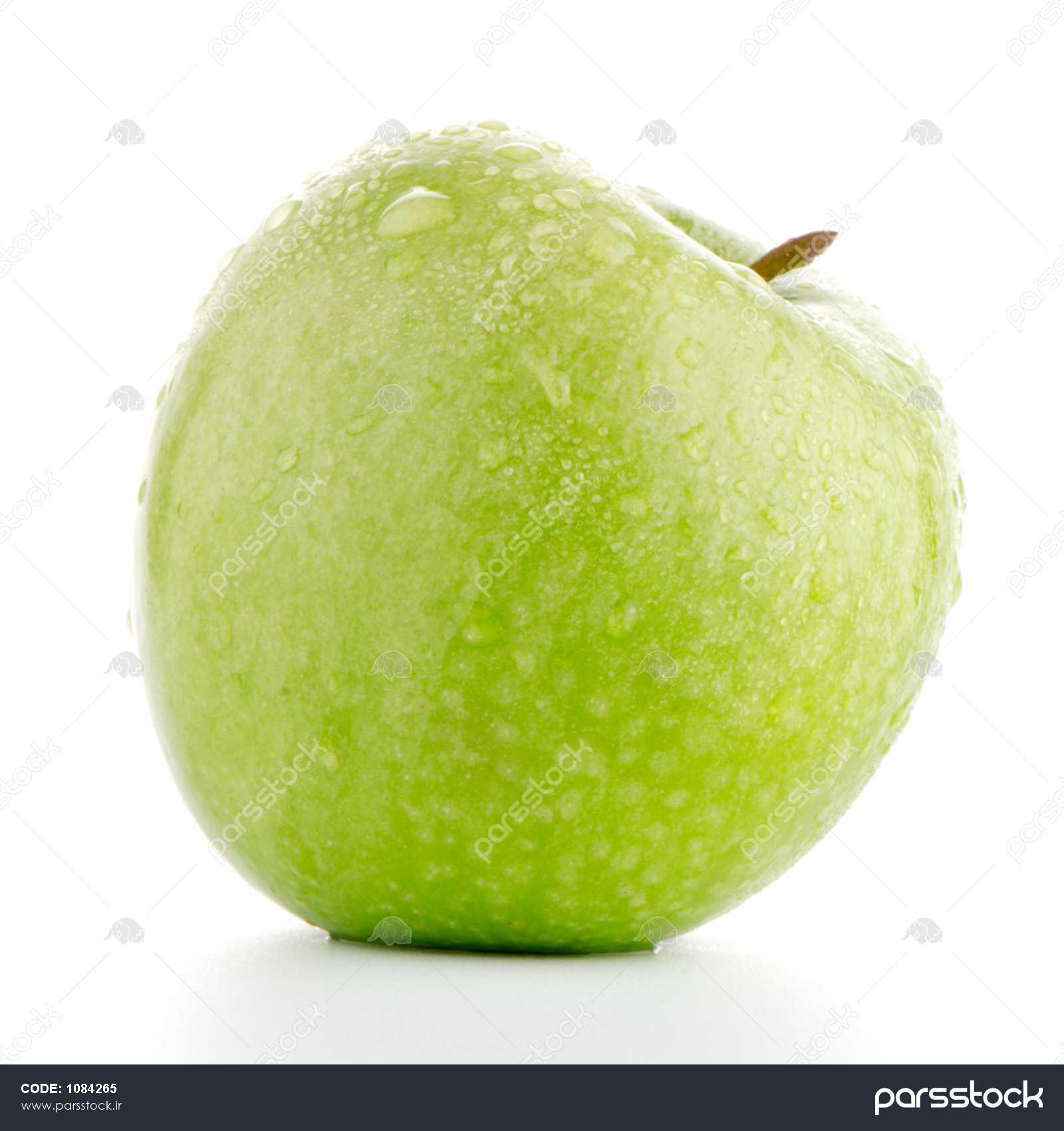 جزئیات نزدیک از سیب سبز در پس زمینه سفید 1084265